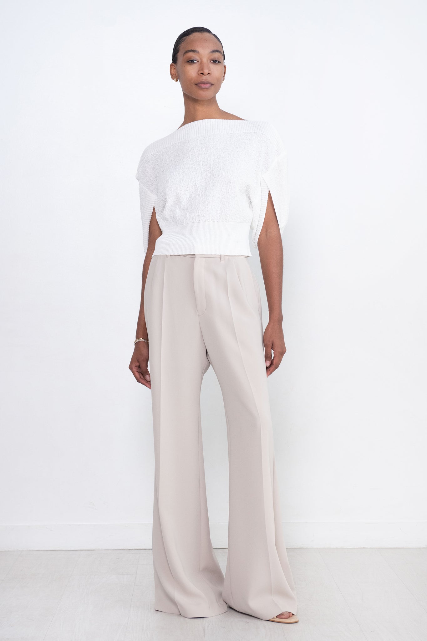 ALL TOPS – Page – Kick Pleat