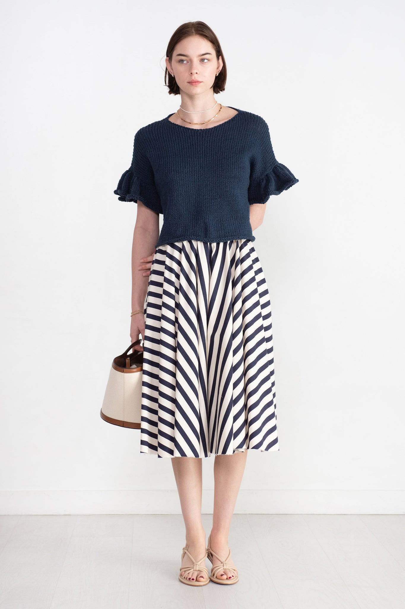 ALL TOPS – Page – Kick Pleat